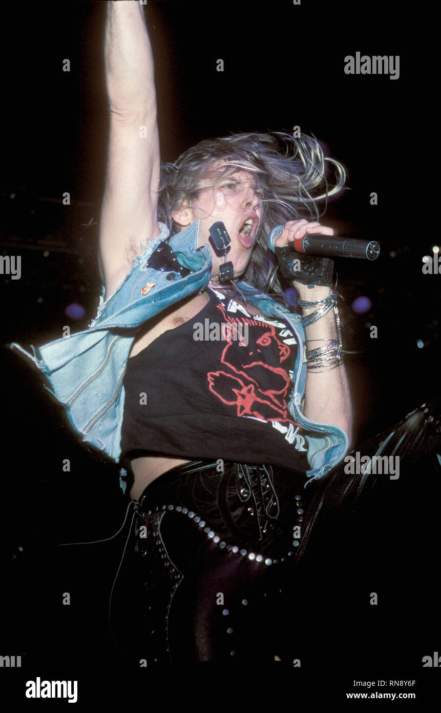 Danger Danger lead singer is shown performing on stage during a "live ...