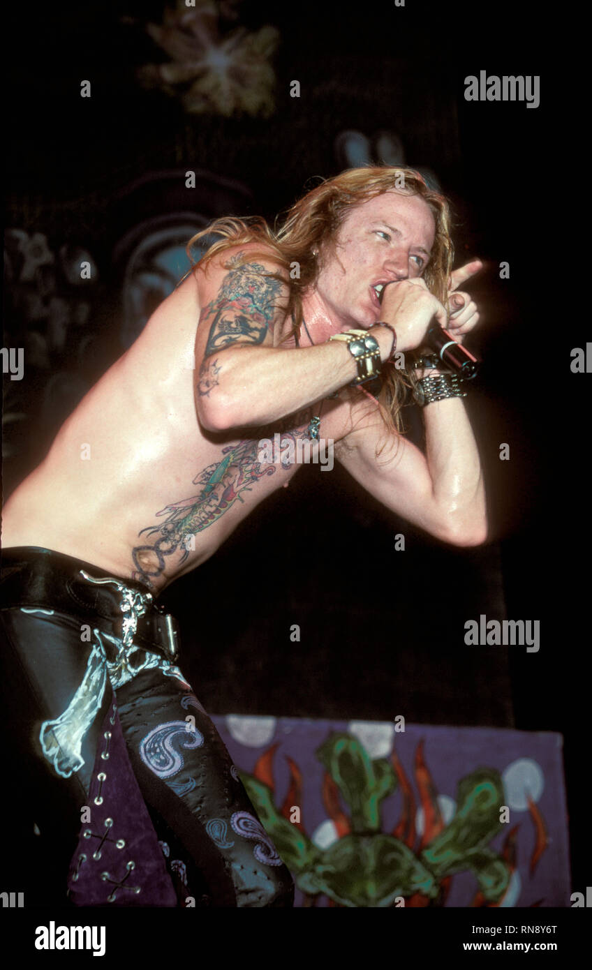 Dangerous Toys lead singer Jason McMaster is shown performing on stage ...