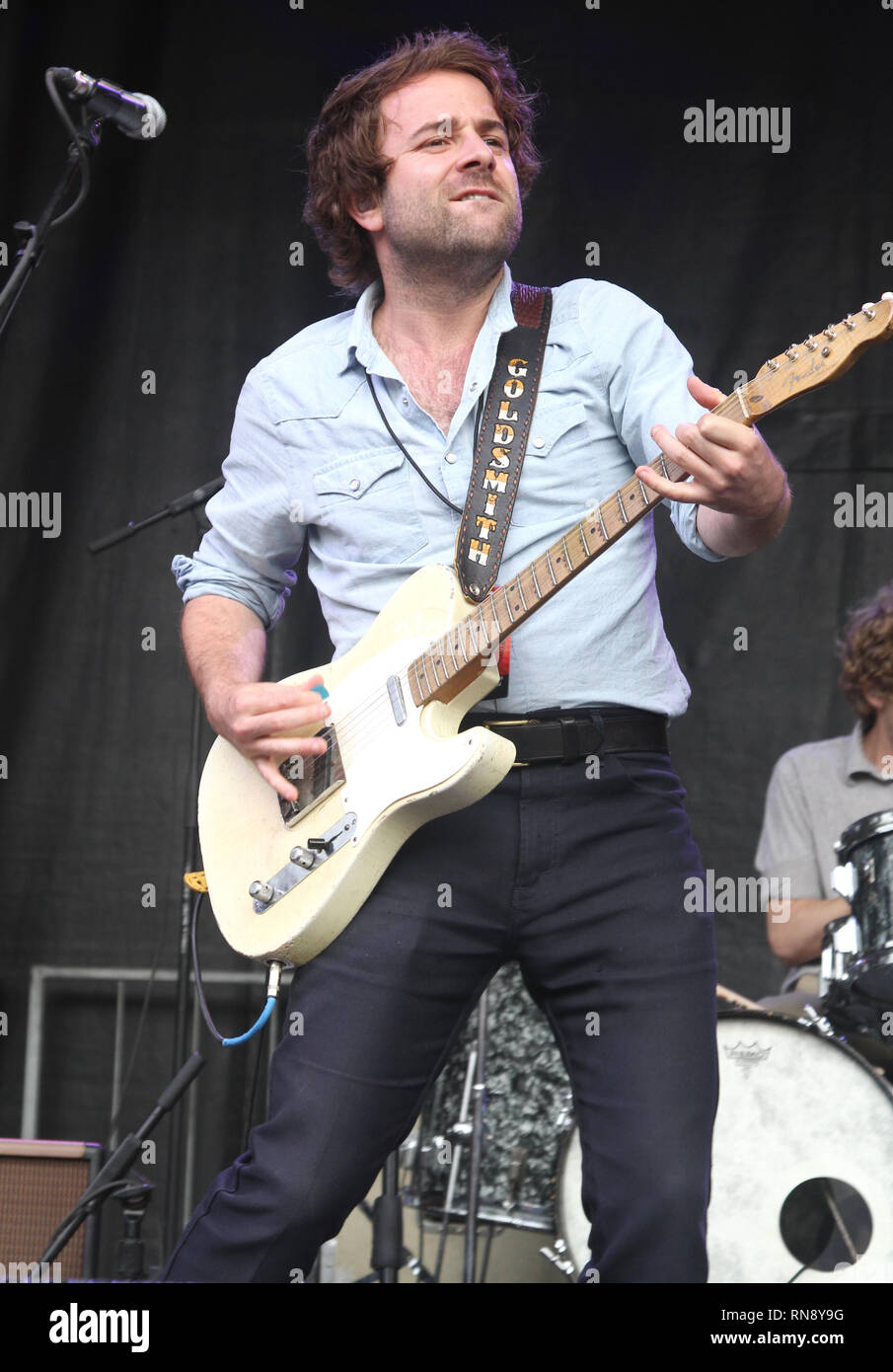 Guitarist and vocalist Taylor Goldsmith is shown performing on stage ...