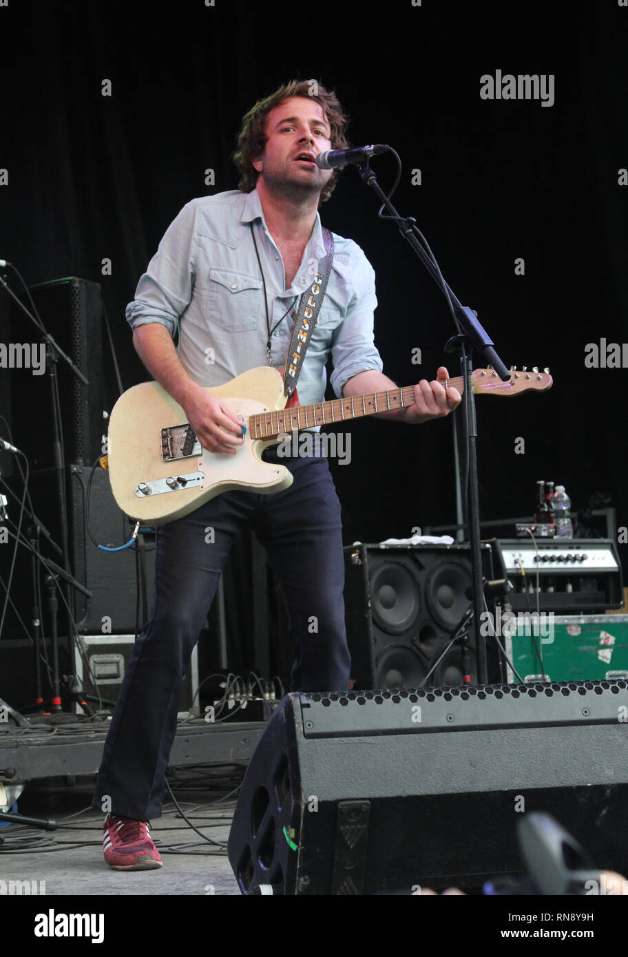 Guitarist and vocalist Taylor Goldsmith is shown performing on stage ...