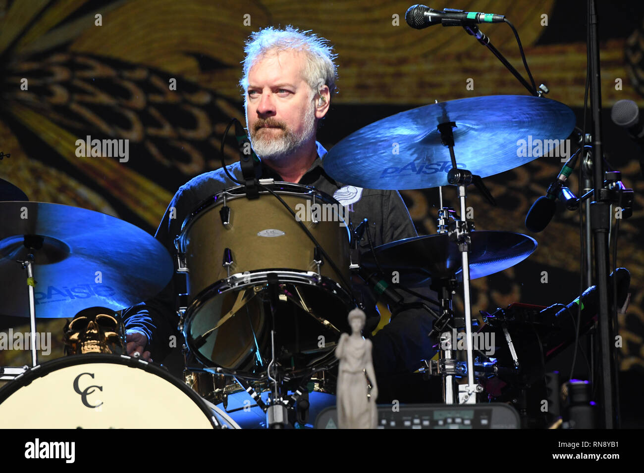 Drummer John Moen is shown performing on stage during a "live" concert ...