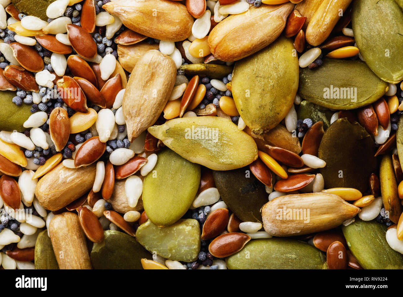 Texture from seeds of pumpkin, sunflower, sesame, linen and poppy Stock ...