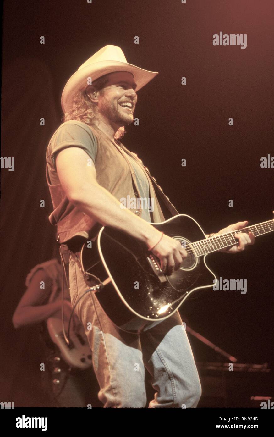 Singing cowboy with guitar hi-res stock photography and images - Alamy