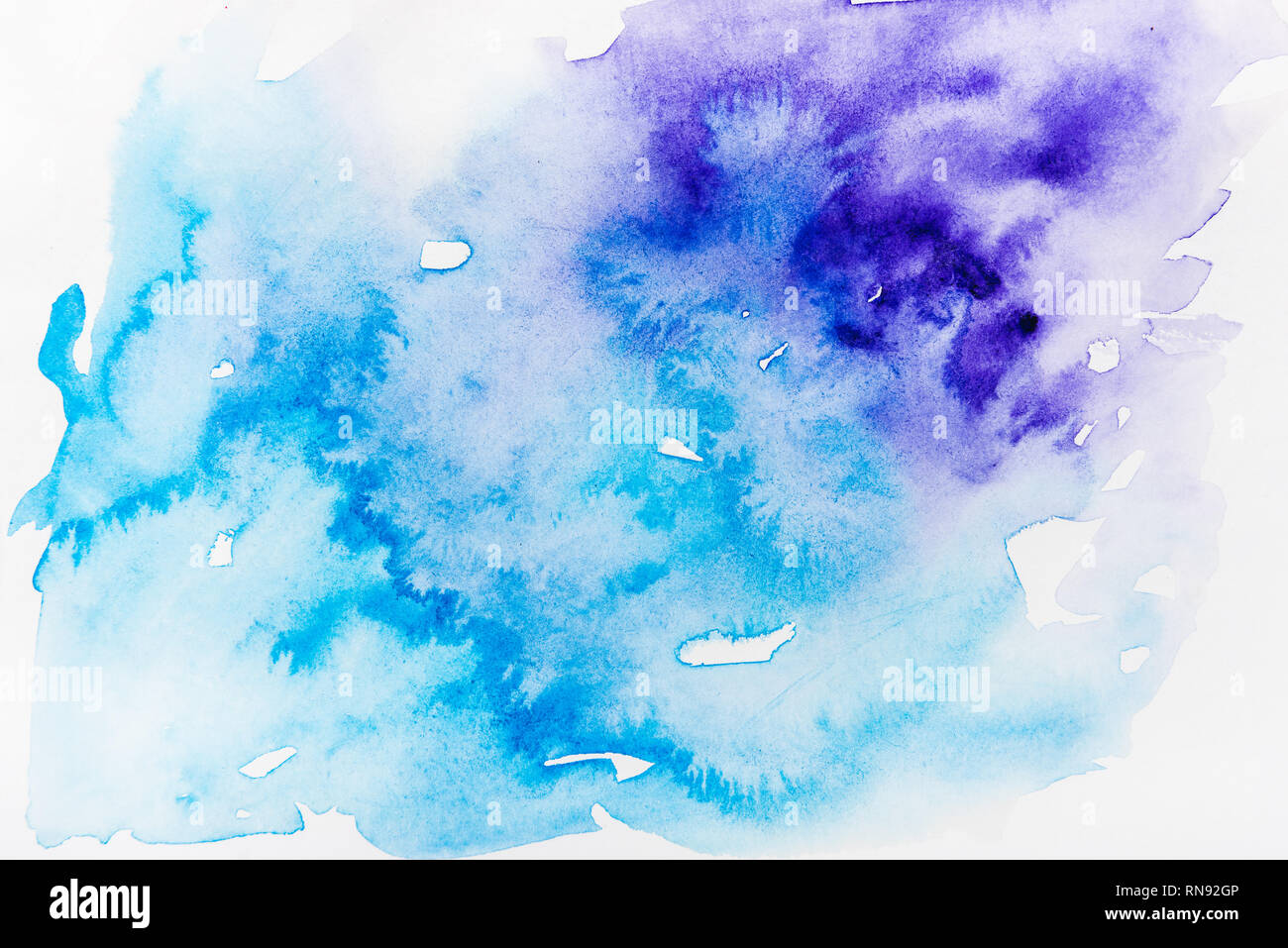 top view of blue and purple spills on white paper Stock Photo - Alamy