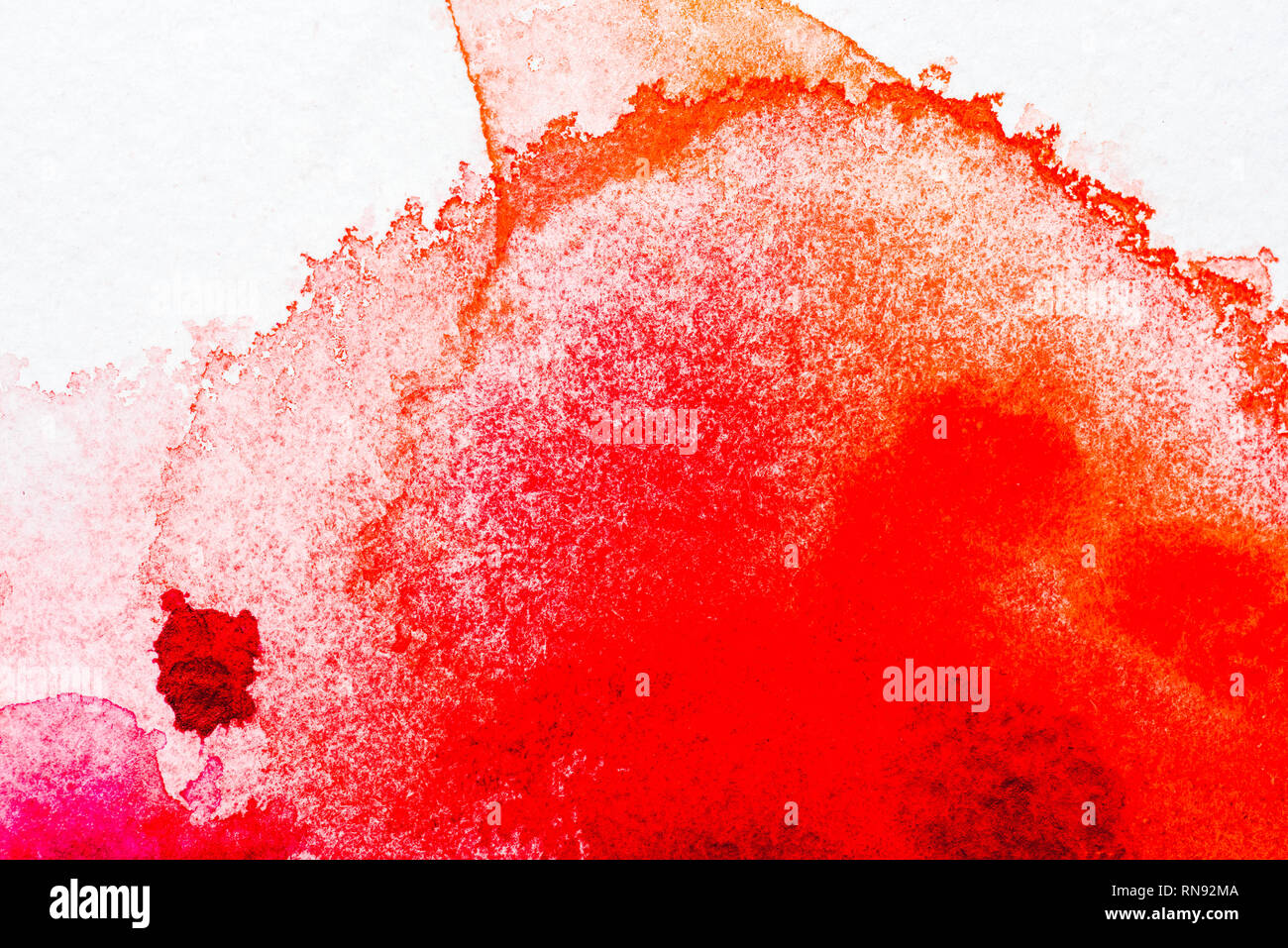 top view of red watercolor spill on white paper with copy space Stock ...