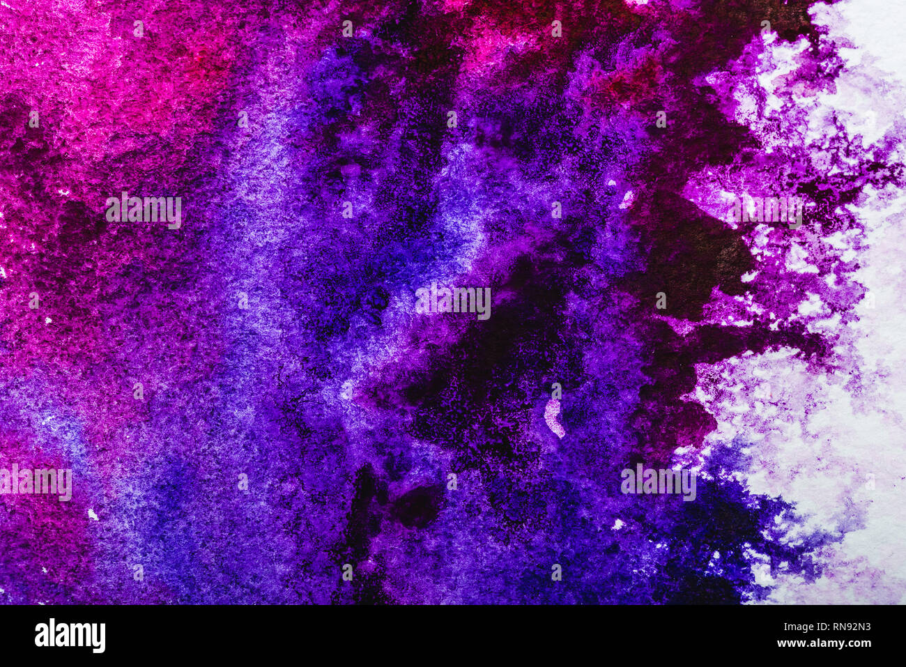 top view of purple and pink watercolor spills on white background Stock ...