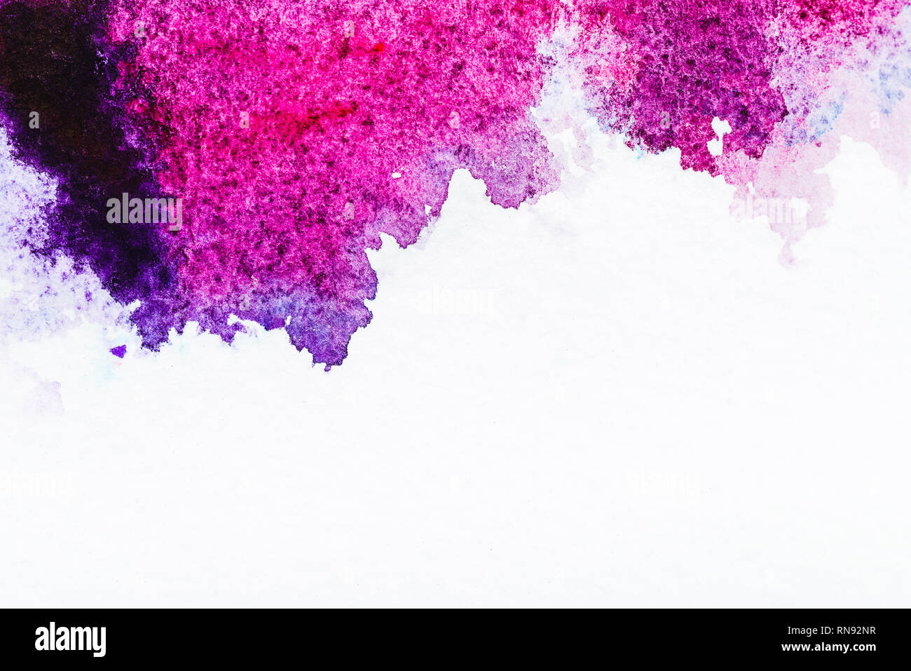 top view of pink watercolor spill on white paper Stock Photo - Alamy