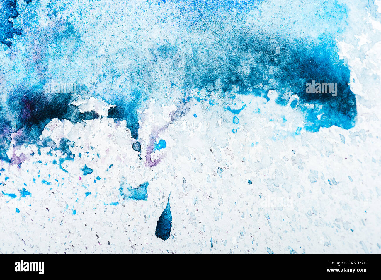 top view of blue watercolor spill on white background Stock Photo - Alamy