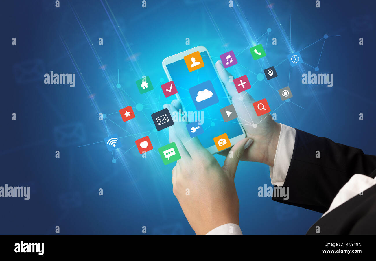 Female hand using smartphone with colorful application icons around ...