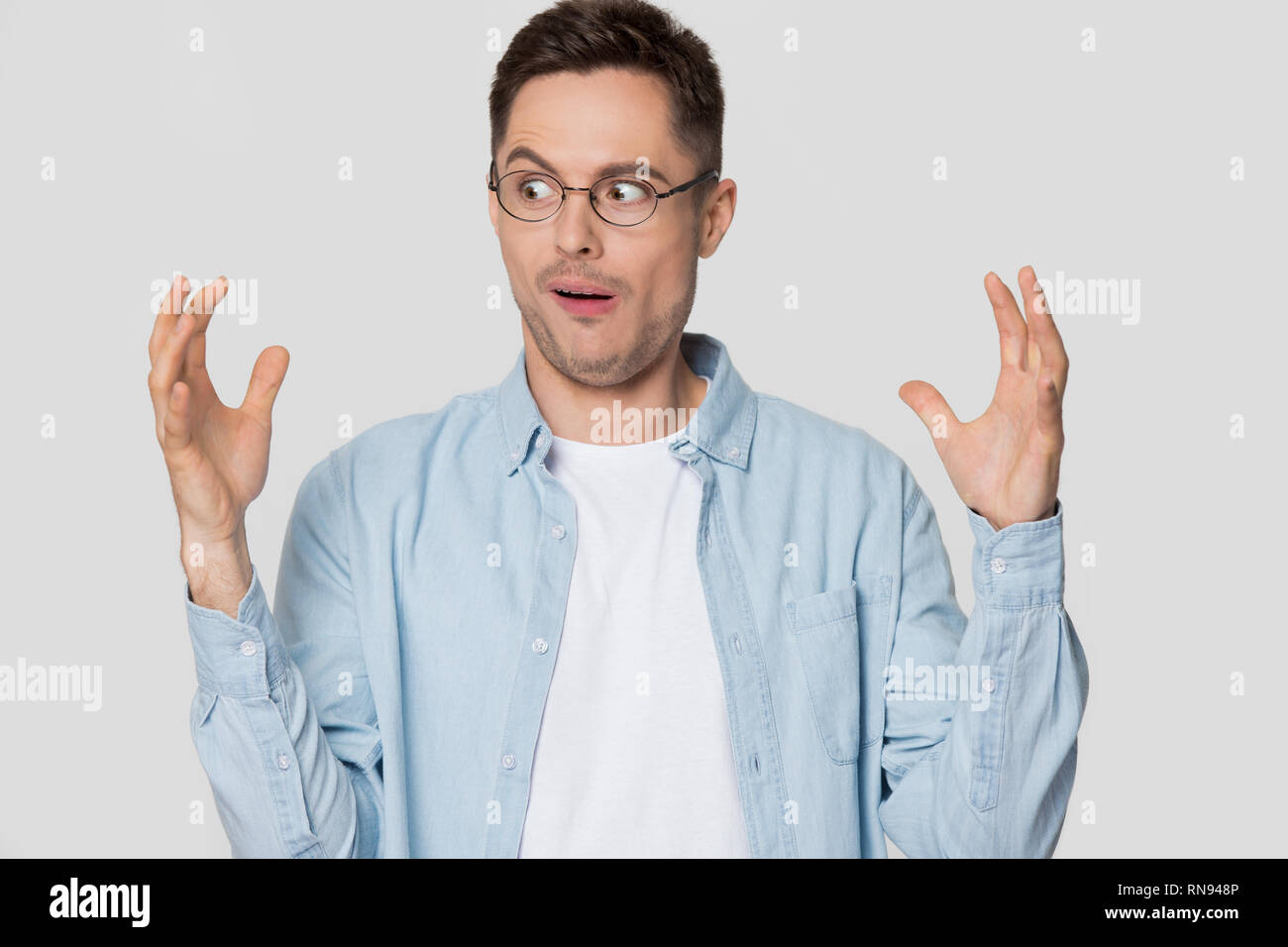 Man looking at hands hi-res stock photography and images - Alamy