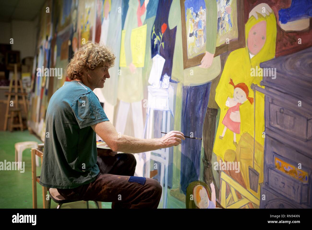 Contemporary artist working in studio hi-res stock photography and ...