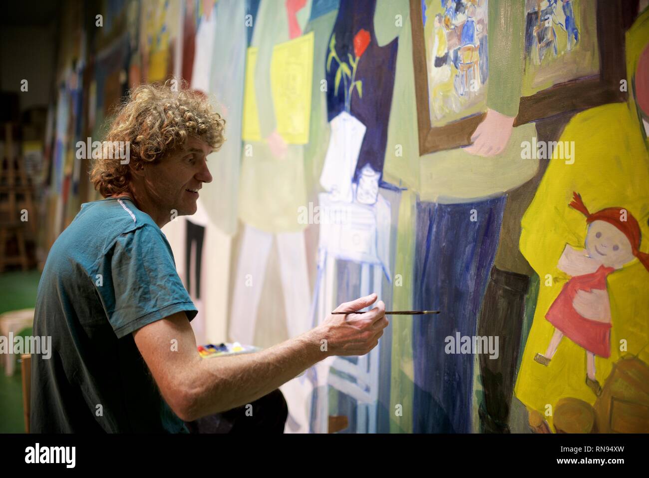 Painter working in his studio Stock Photo - Alamy