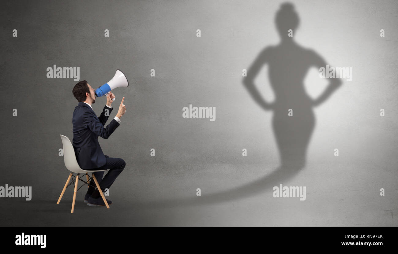 Rich businessman staying and offering stuffs to a pretty shadow woman ...