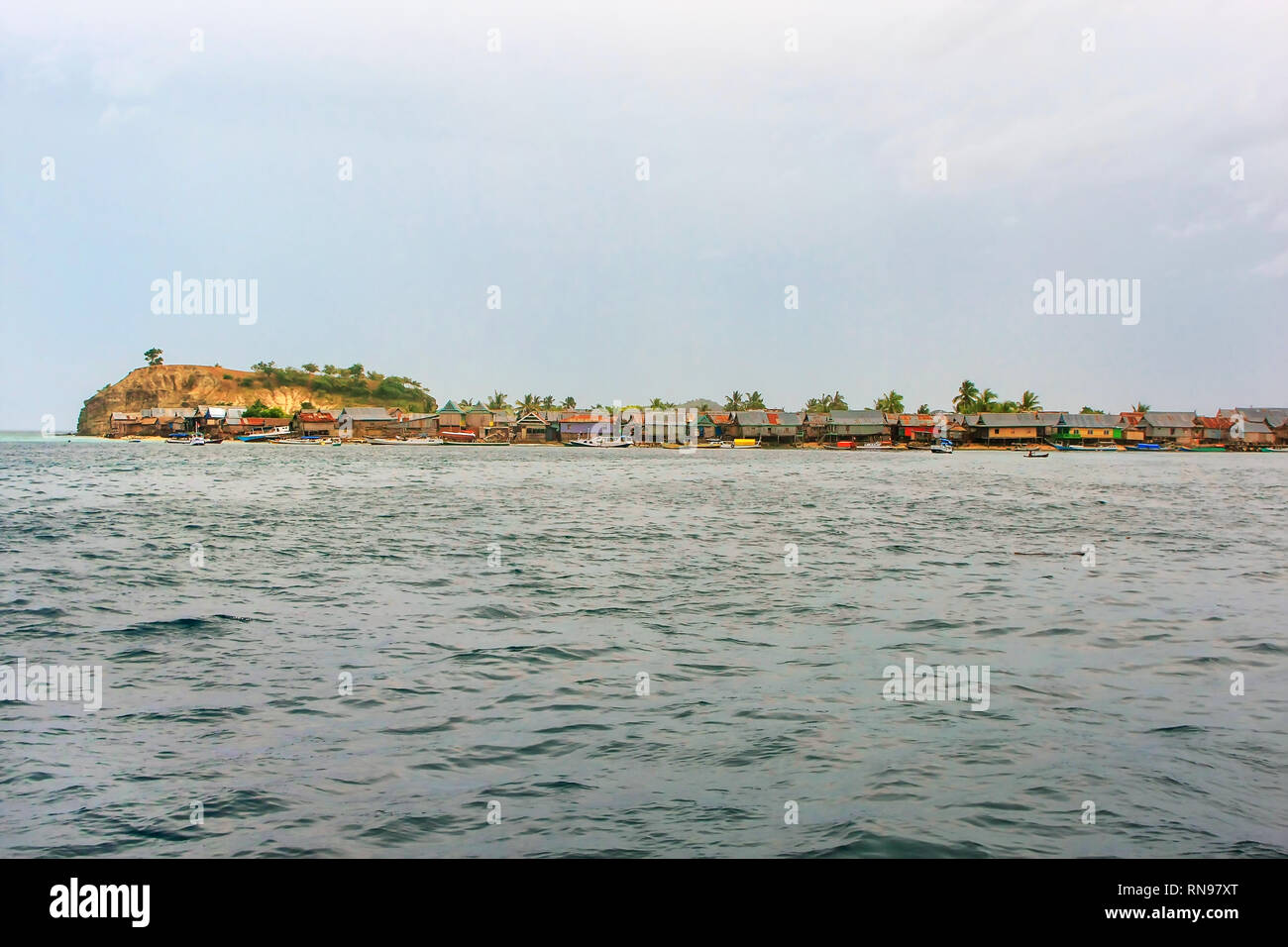 Small island with typical village in Komodo National Park, Nusa ...