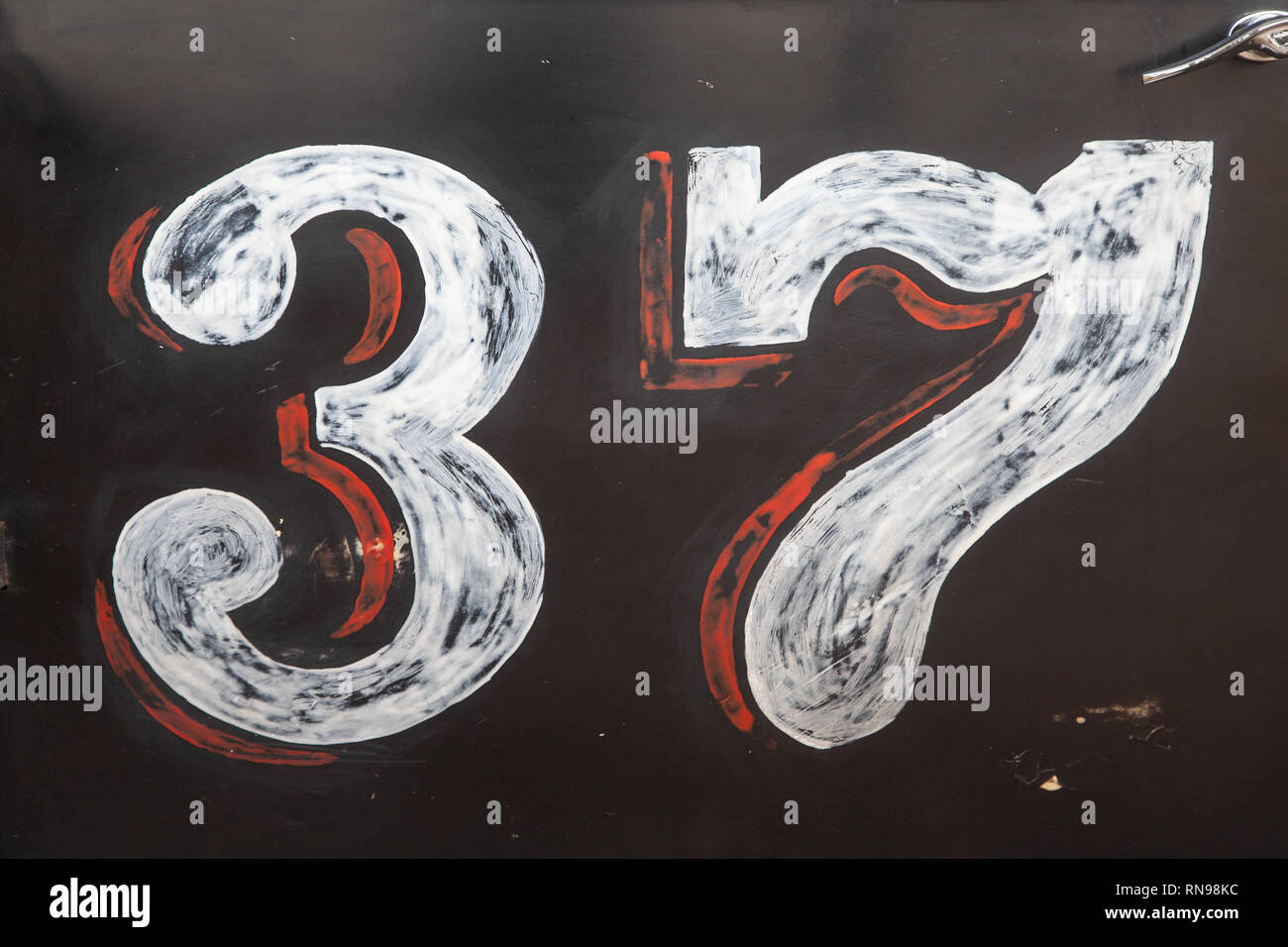 37 Racing Number Painted on Car Stock Photo - Alamy