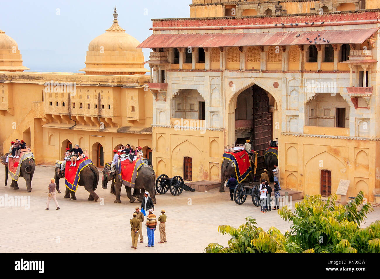 Decorated elephants entering Suraj Pol in Jaleb Chowk (main courtyard ...