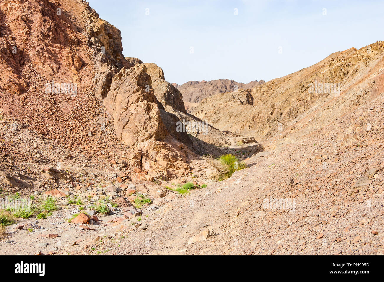 The route or walking path, track through the yellow red rocky ...