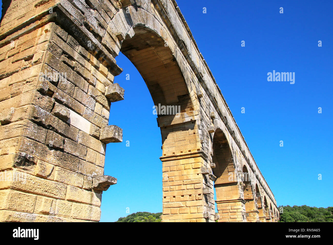Close view of Aqueduct Pont du Gard in southern France. It is the ...