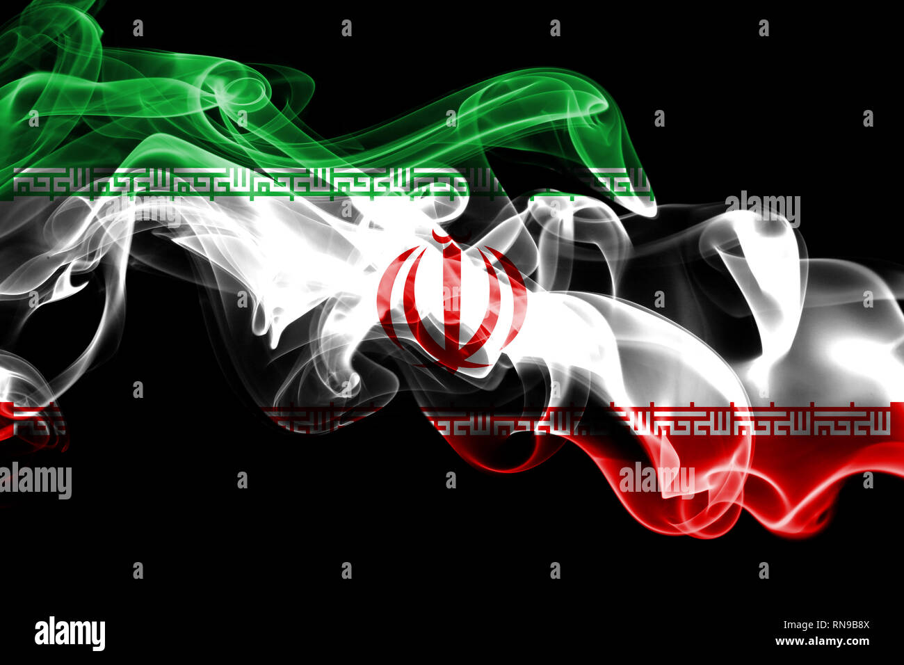 National flag of Iran made from colored smoke isolated on black ...