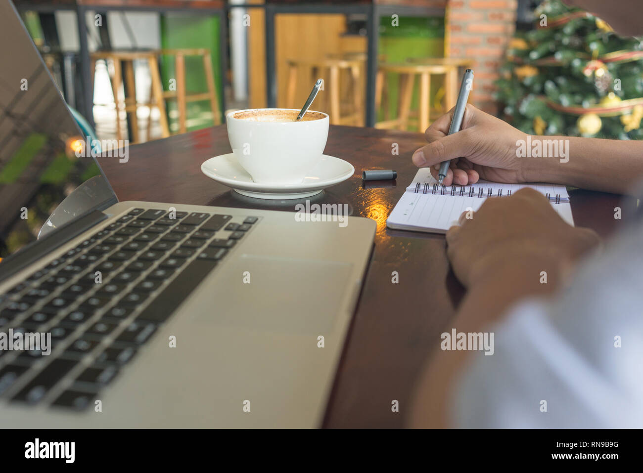 Human hand writing notes Stock Photo - Alamy
