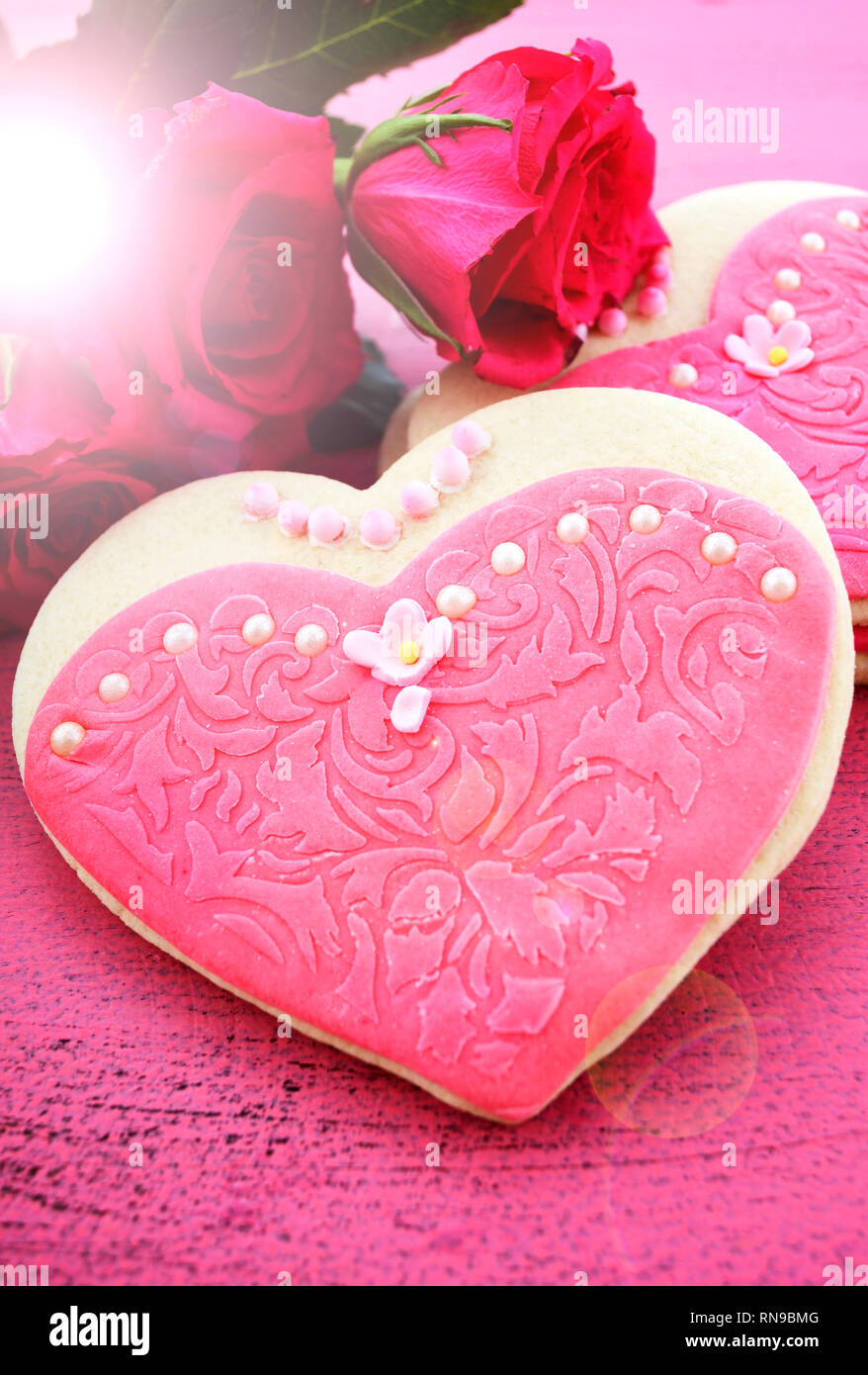 International Women's Day heart shape cookies decorated as pink ladies ...