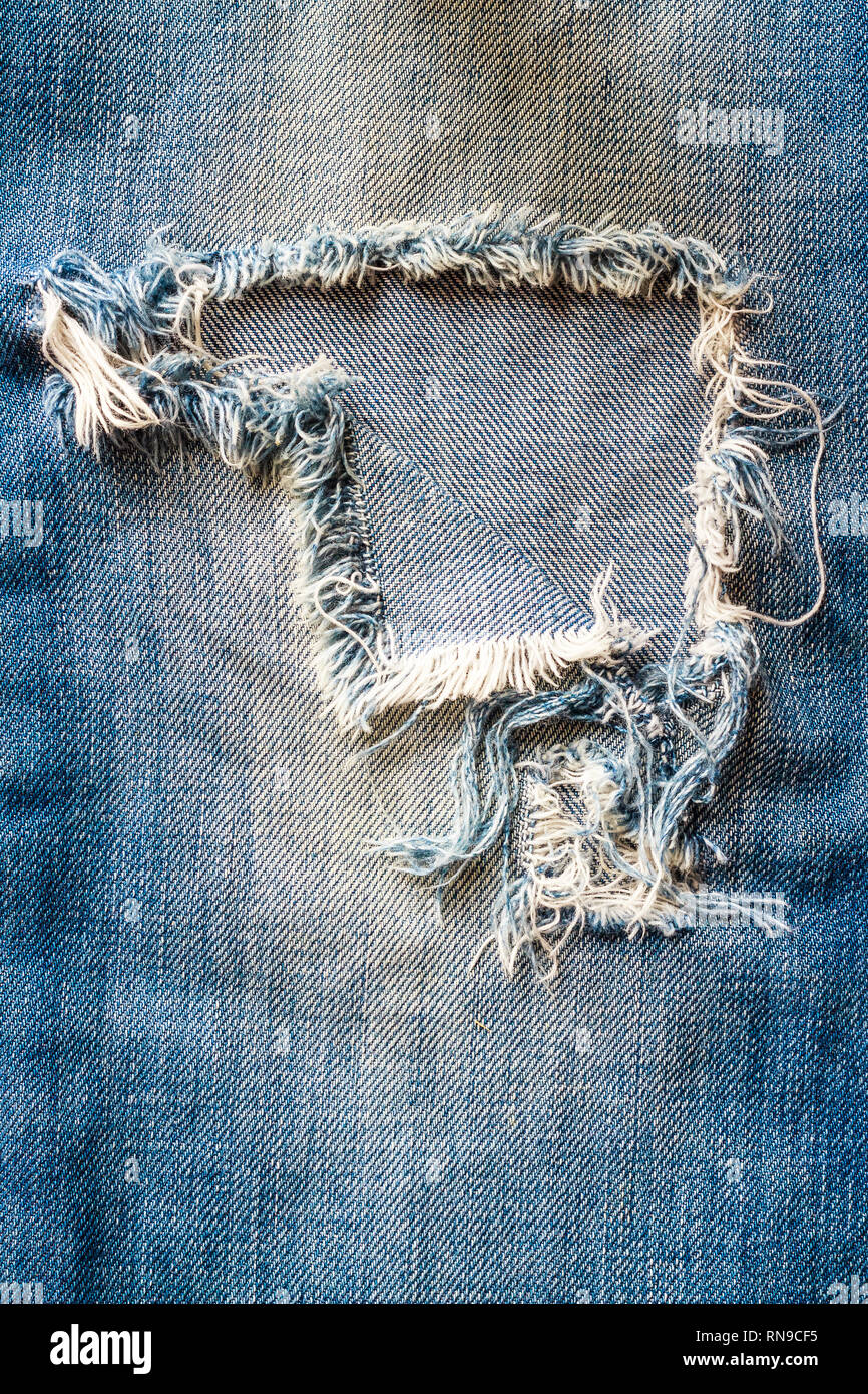 Torn denim hi-res stock photography and images - Alamy