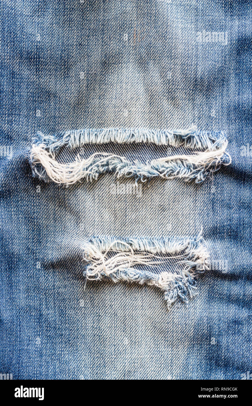 Torn Denim Wallpaper