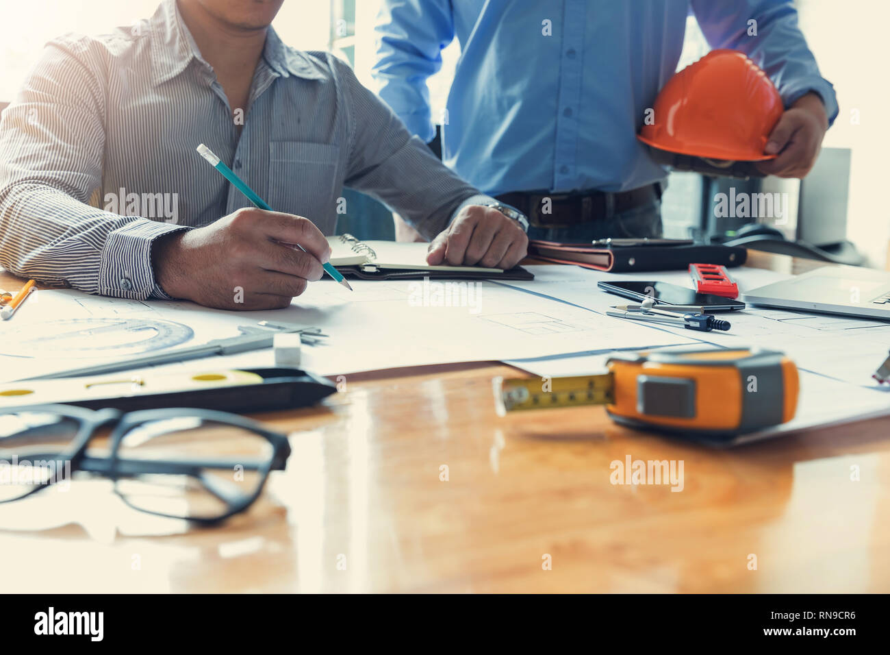 Engineer and Architect concept, Engineer Architects office team working ...