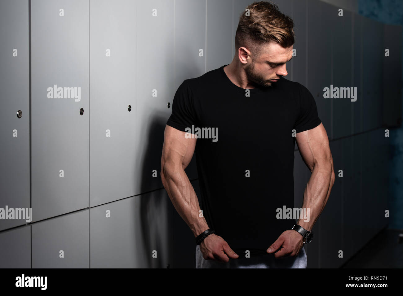 Young Fit Adult Man Standing In Locker Room Of Gym Facility Stock Photo ...