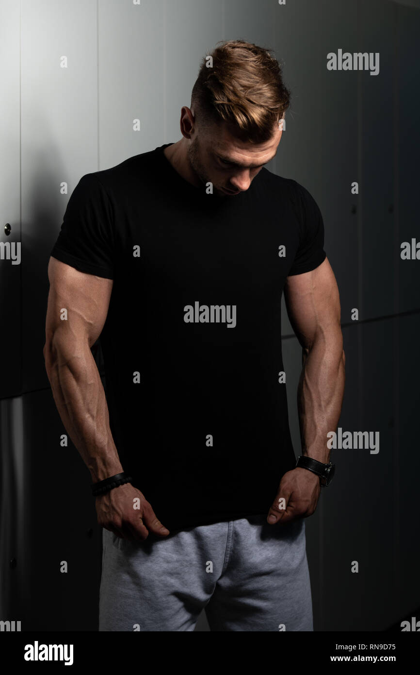 Young Fit Adult Man Standing In Locker Room Of Gym Facility Stock Photo ...