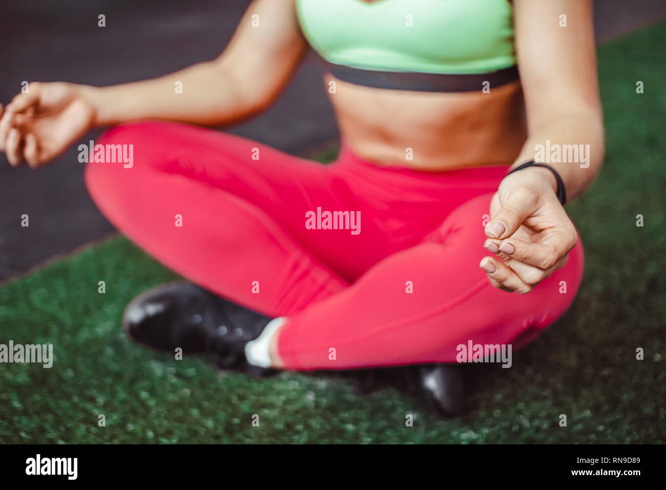 woman doing leg stretching, in a butterfly pose Stock Photo - Alamy