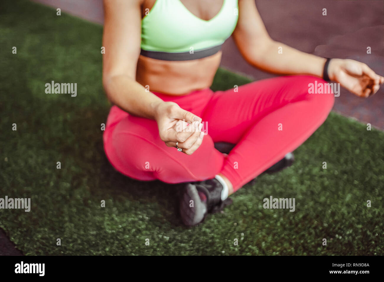 woman doing leg stretching, in a butterfly pose Stock Photo - Alamy