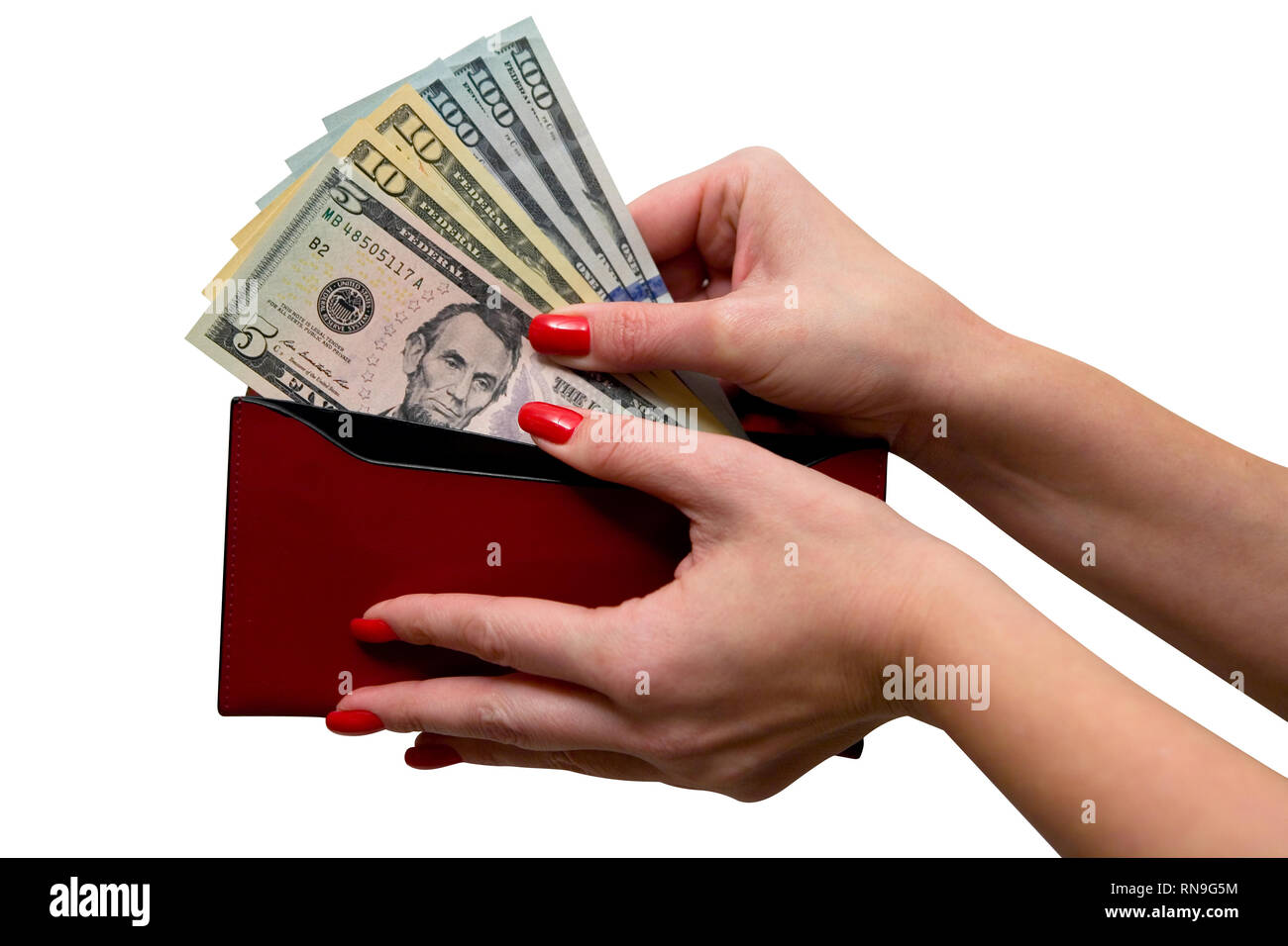 Elegant women's hands hold the purse and banknotes. Dollars. Isolate on ...