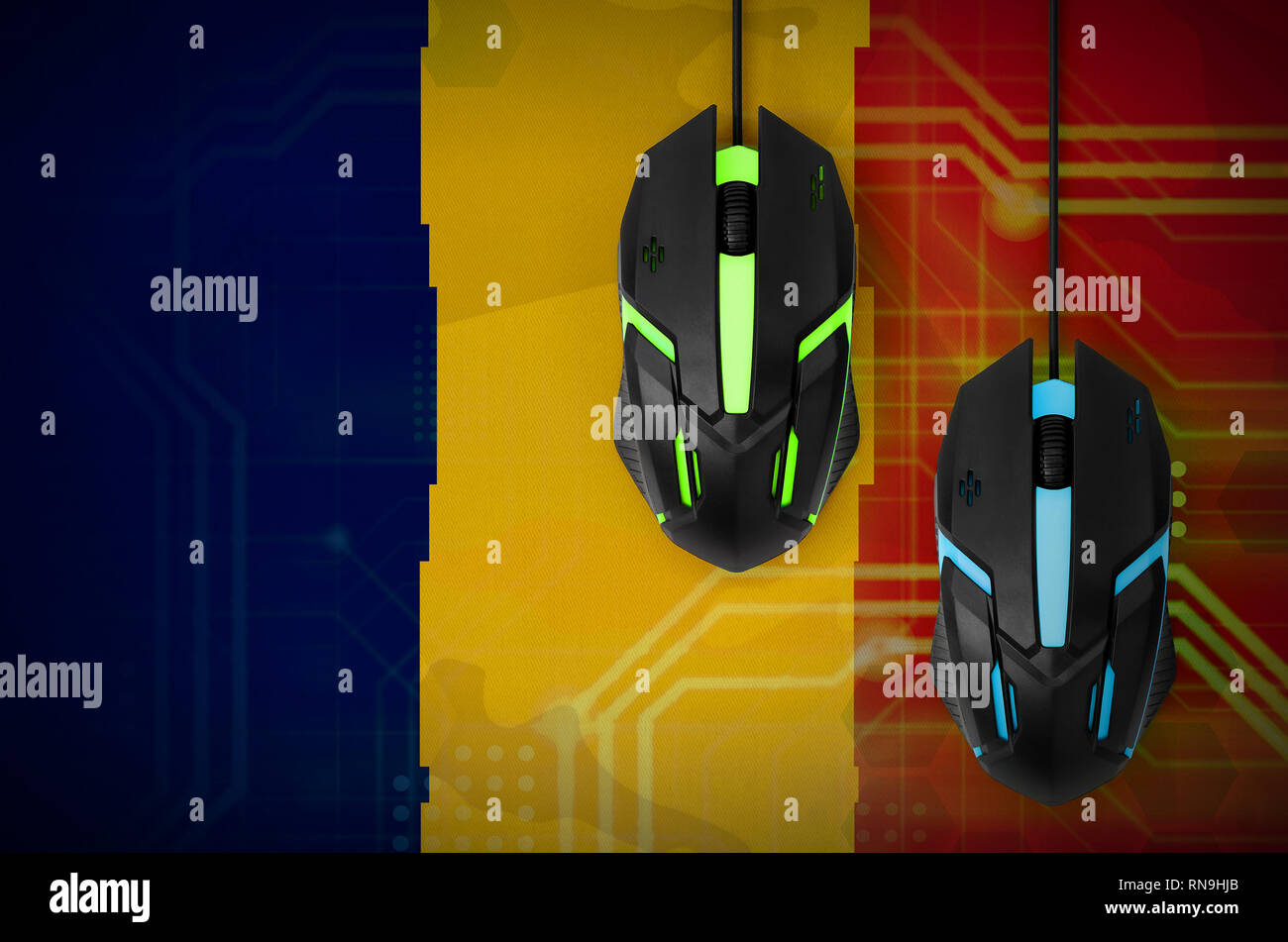 Chad flag and two modern computer mice with backlight. The concept of ...