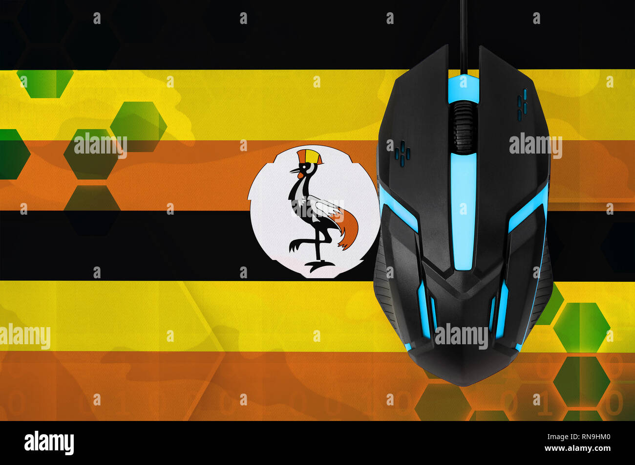 Uganda flag and modern backlit computer mouse. Concept of country ...