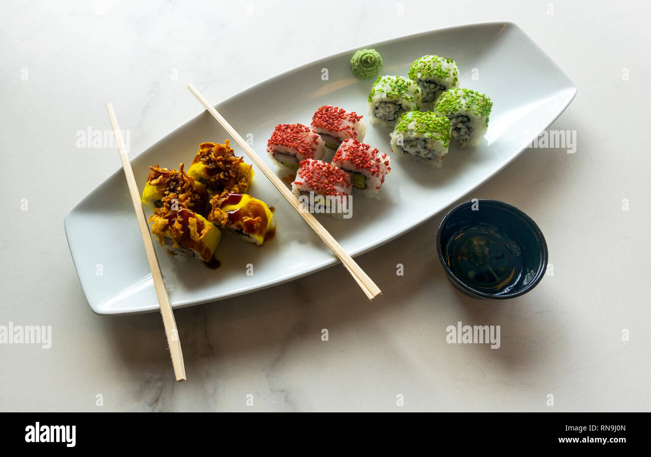 Dish of mixed Japanese rolls, maki Stock Photo - Alamy