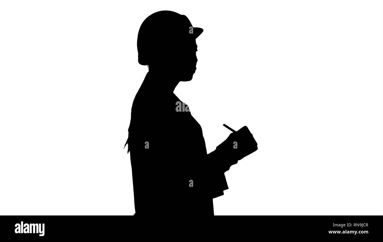 Silhouette Woman engineer with helmet is holding pen and checklist ...