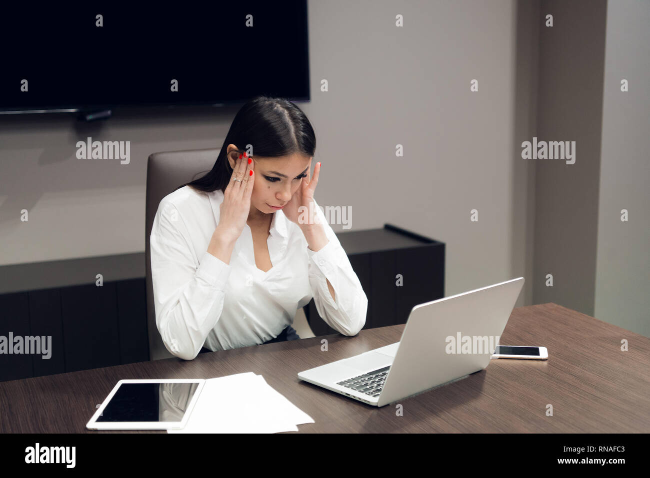 Portrait of exhausted and tired business woman in the office ... Portrait of exhausted and tired business woman in the office ...