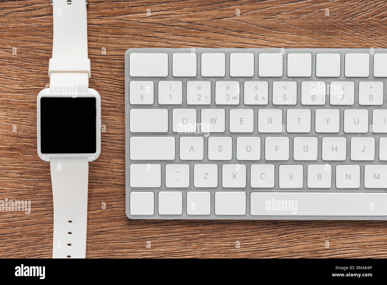 Smartwatch keyboard wooden table hi-res stock photography and images ...