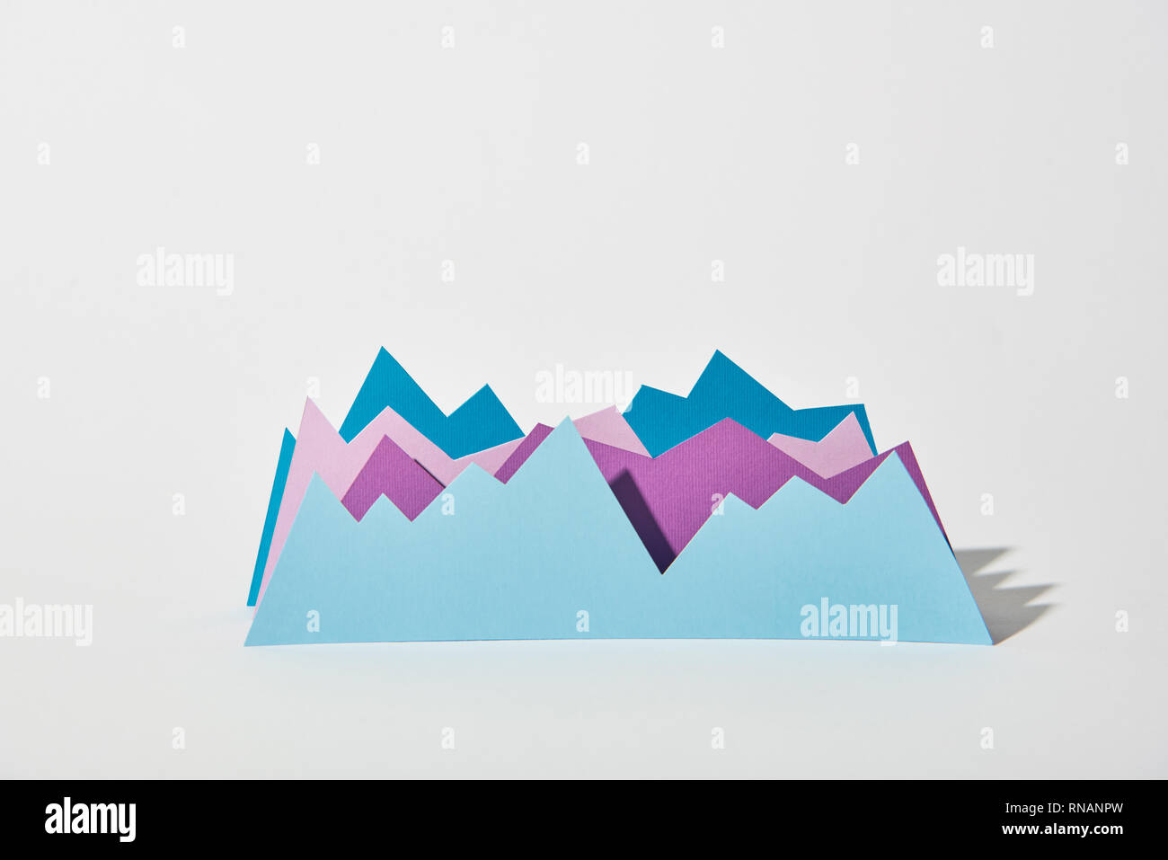 blue and purple paper graphs on white background Stock Photo - Alamy
