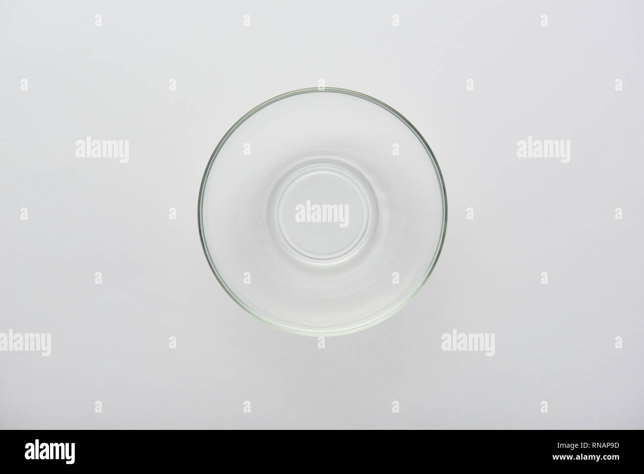 top view of transparent glass bowl on grey background Stock Photo - Alamy