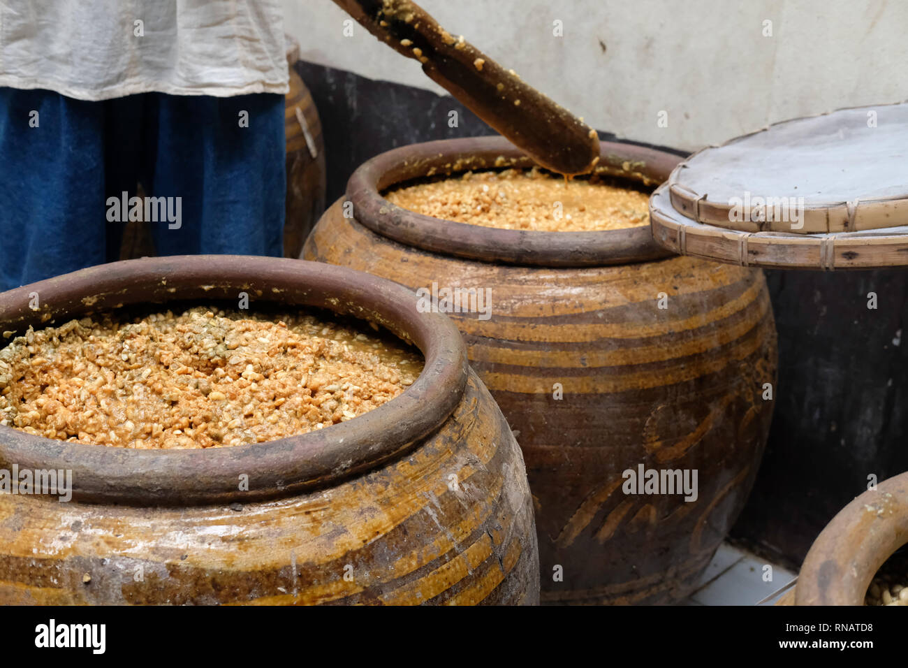 salted soybean paste fermented in jar. soy production Stock Photo - Alamy