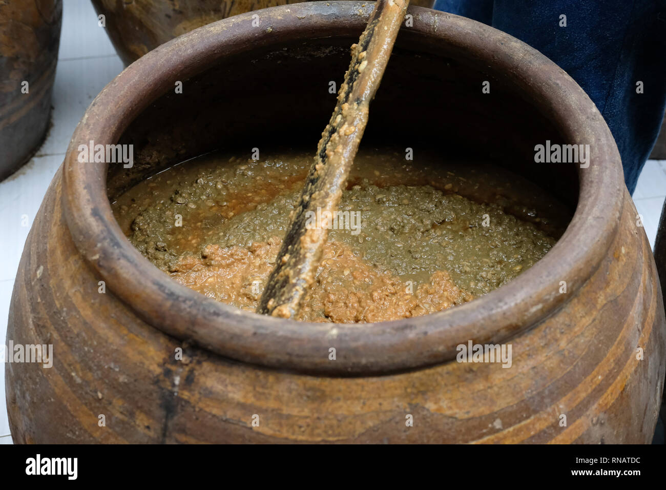 salted soybean paste fermented in jar. soy production Stock Photo - Alamy