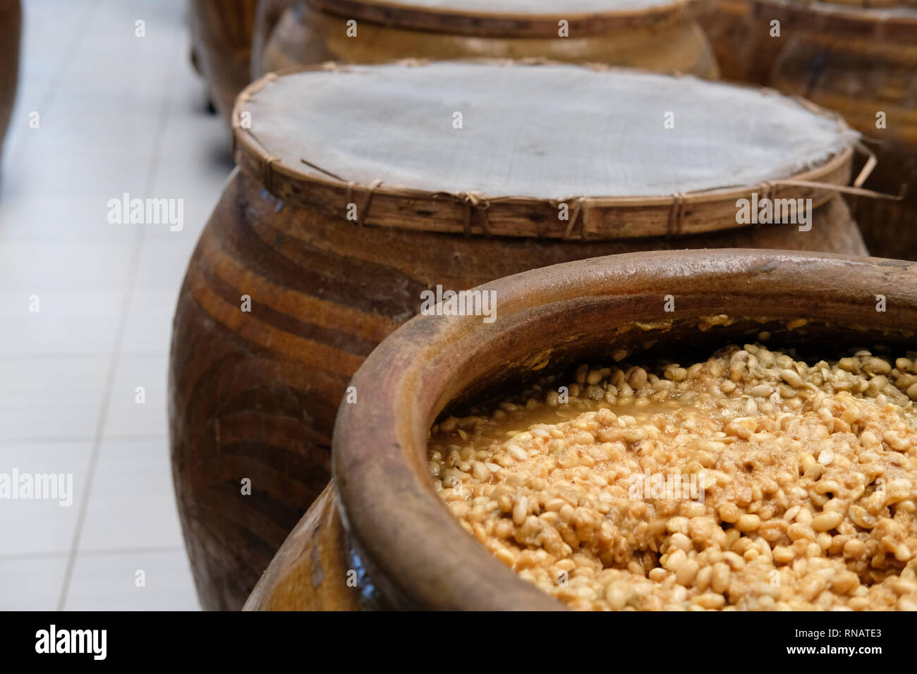 salted soybean paste fermented in jar. soy production Stock Photo - Alamy