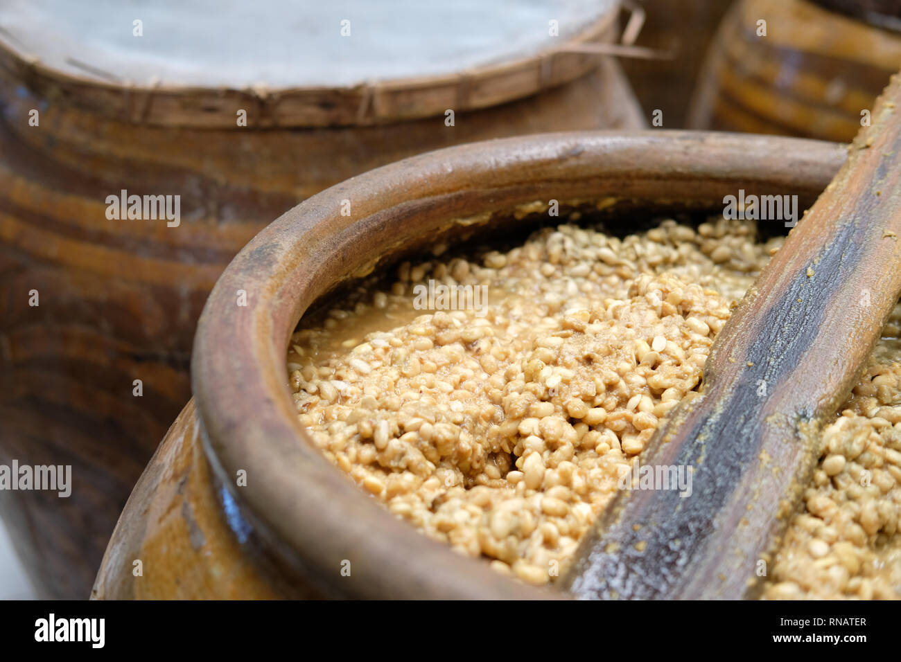 salted soybean paste fermented in jar. soy production Stock Photo - Alamy