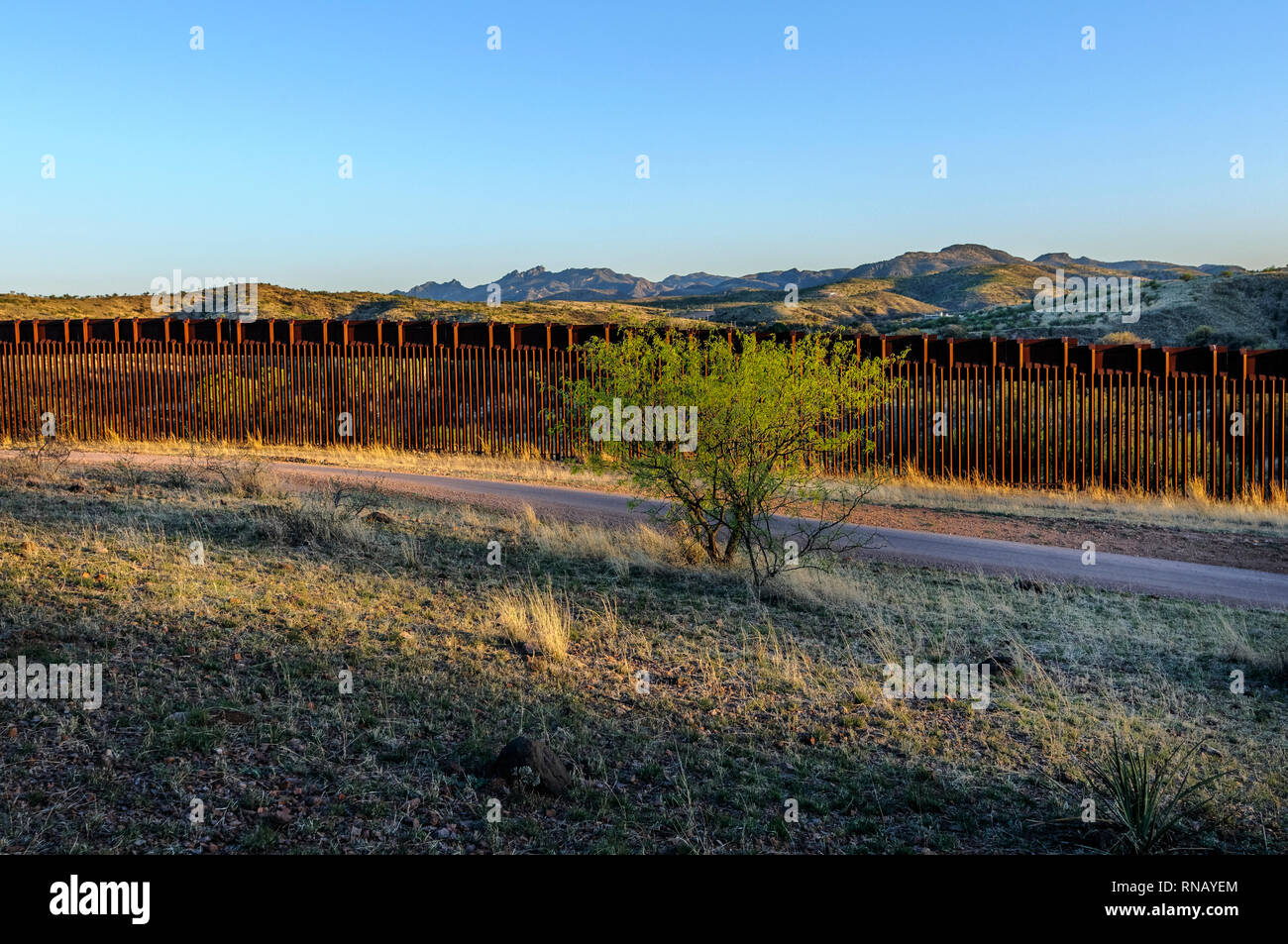 US border fence on Mexico boundary, bollard style pedestrian barrier ...