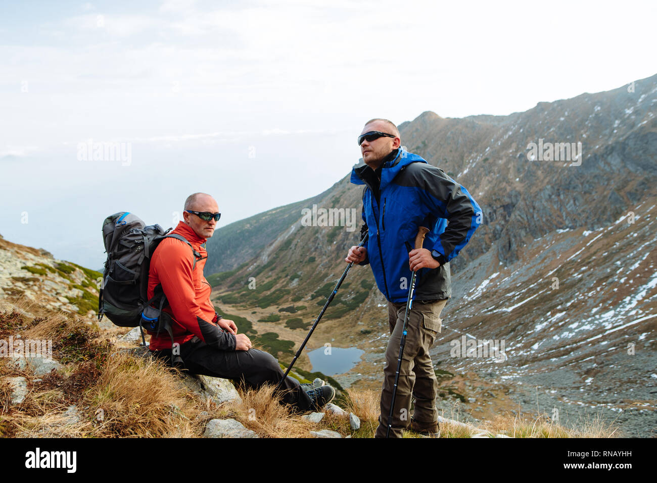Two cheerful men one sporting hi-res stock photography and images - Alamy