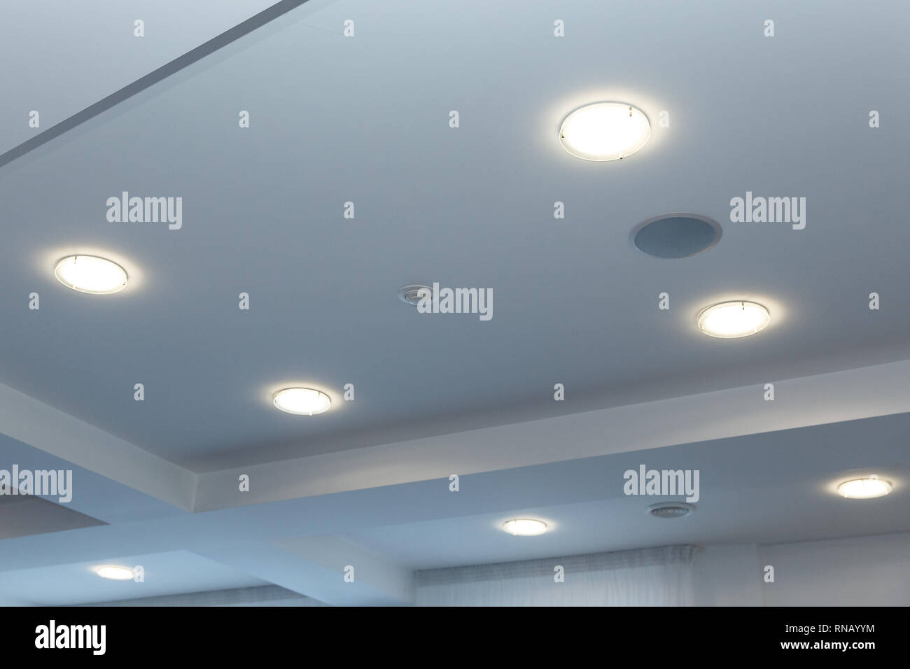 Modern layered ceiling with embedded lights and stretched ceiling inlay ...