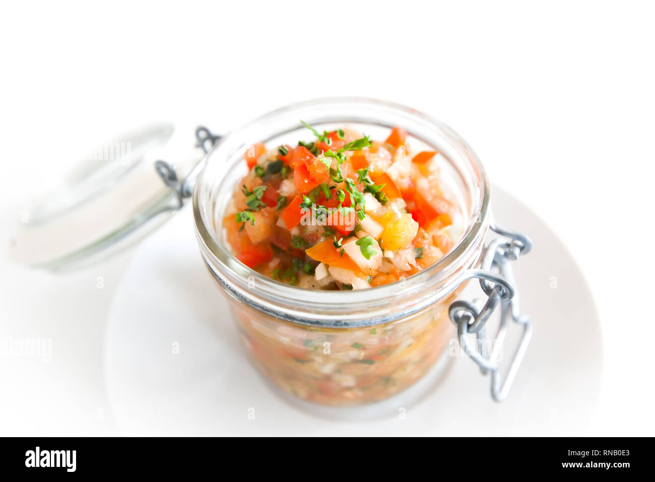 Fresh salsa dip in a jar isolated on white background Stock Photo - Alamy