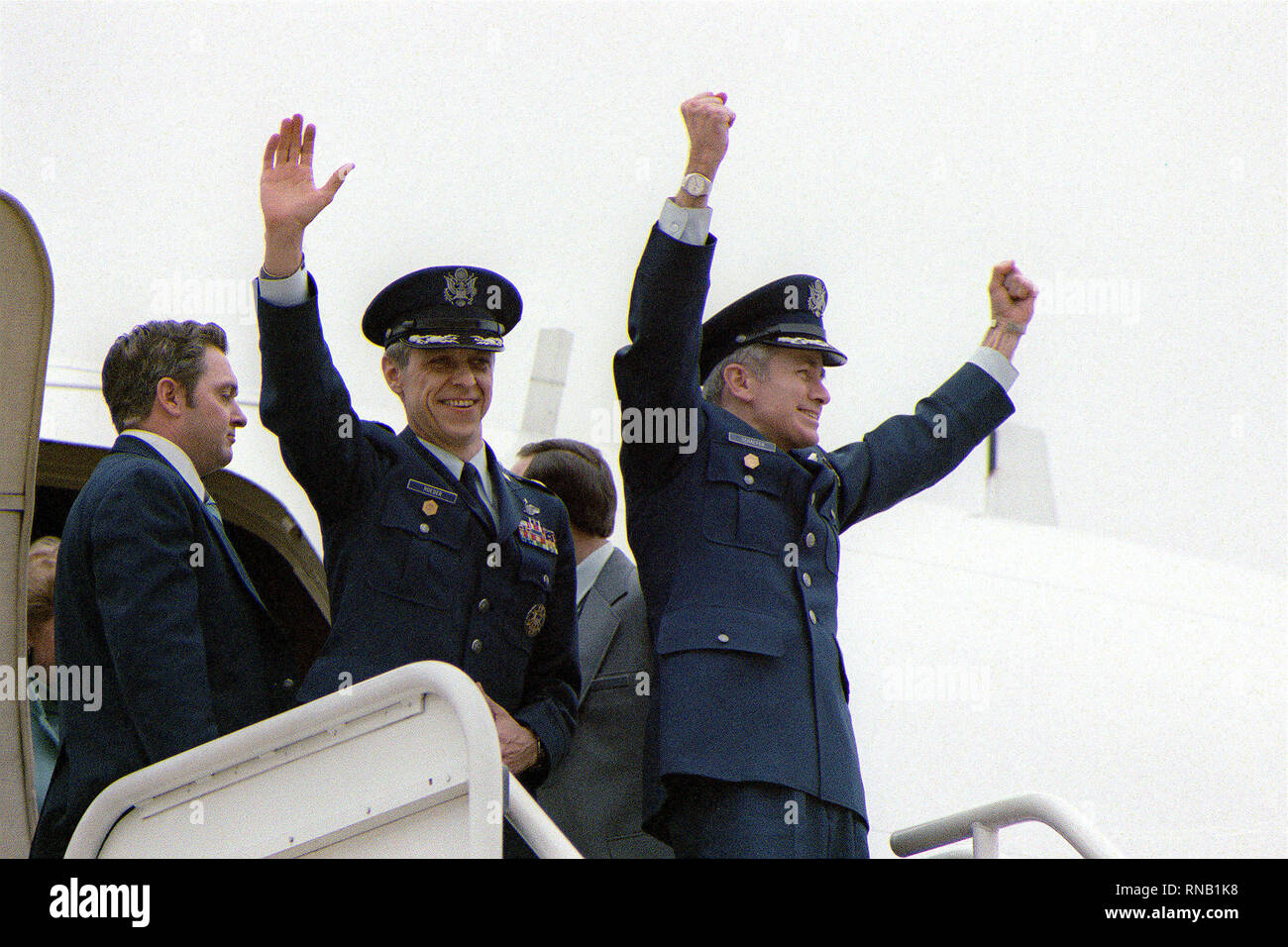 LTC Donald M. Roeder, left, and COL Thomas E. Schaefer wave to the ...
